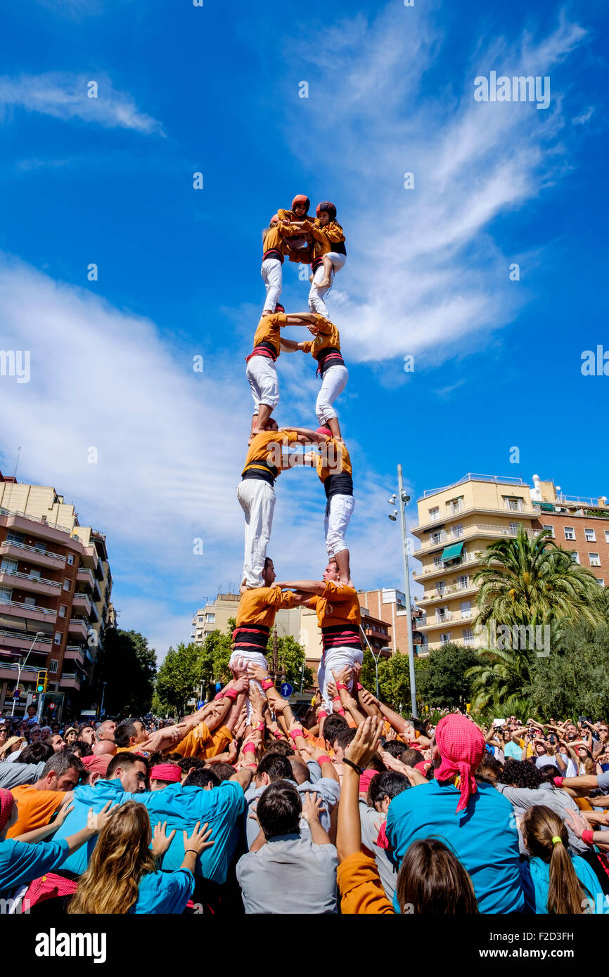 Castellers building human towers at the Sagrada Família, Barcelona ...