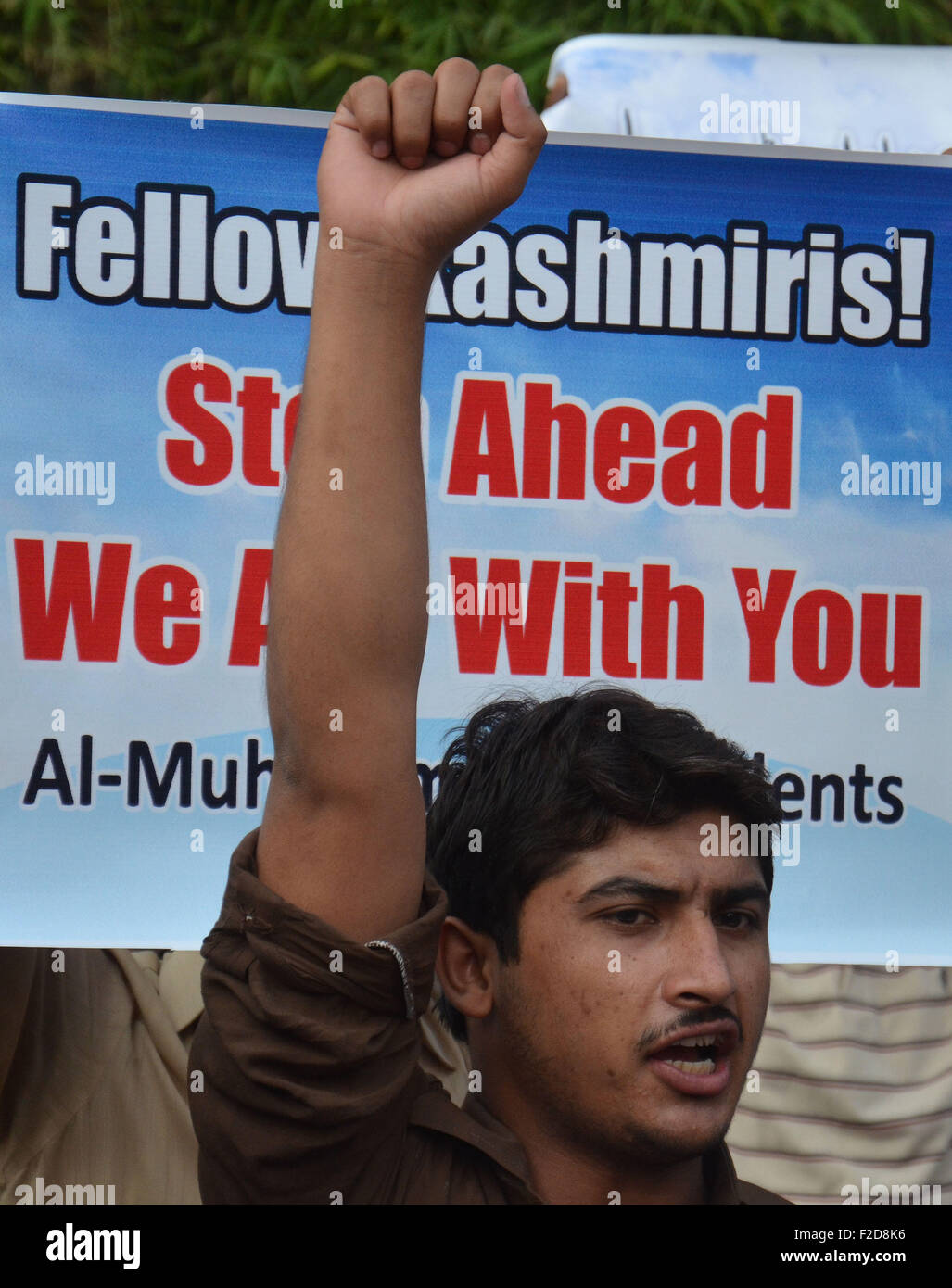 Lahore, Pakistan. 16th Sep, 2015. A Pakistani student raises his fist ...