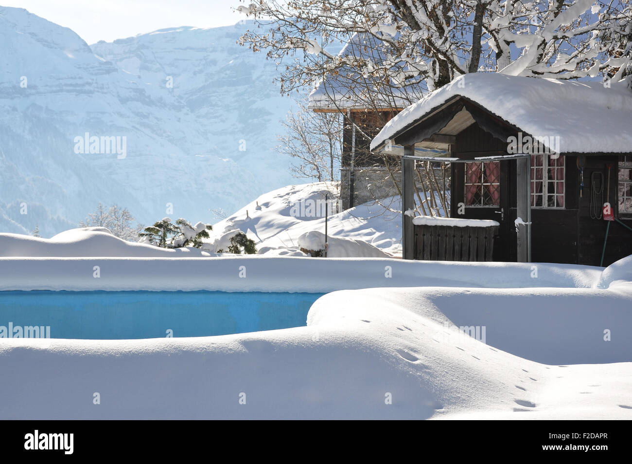 Swimming pool covered with snow Stock Photo - Alamy