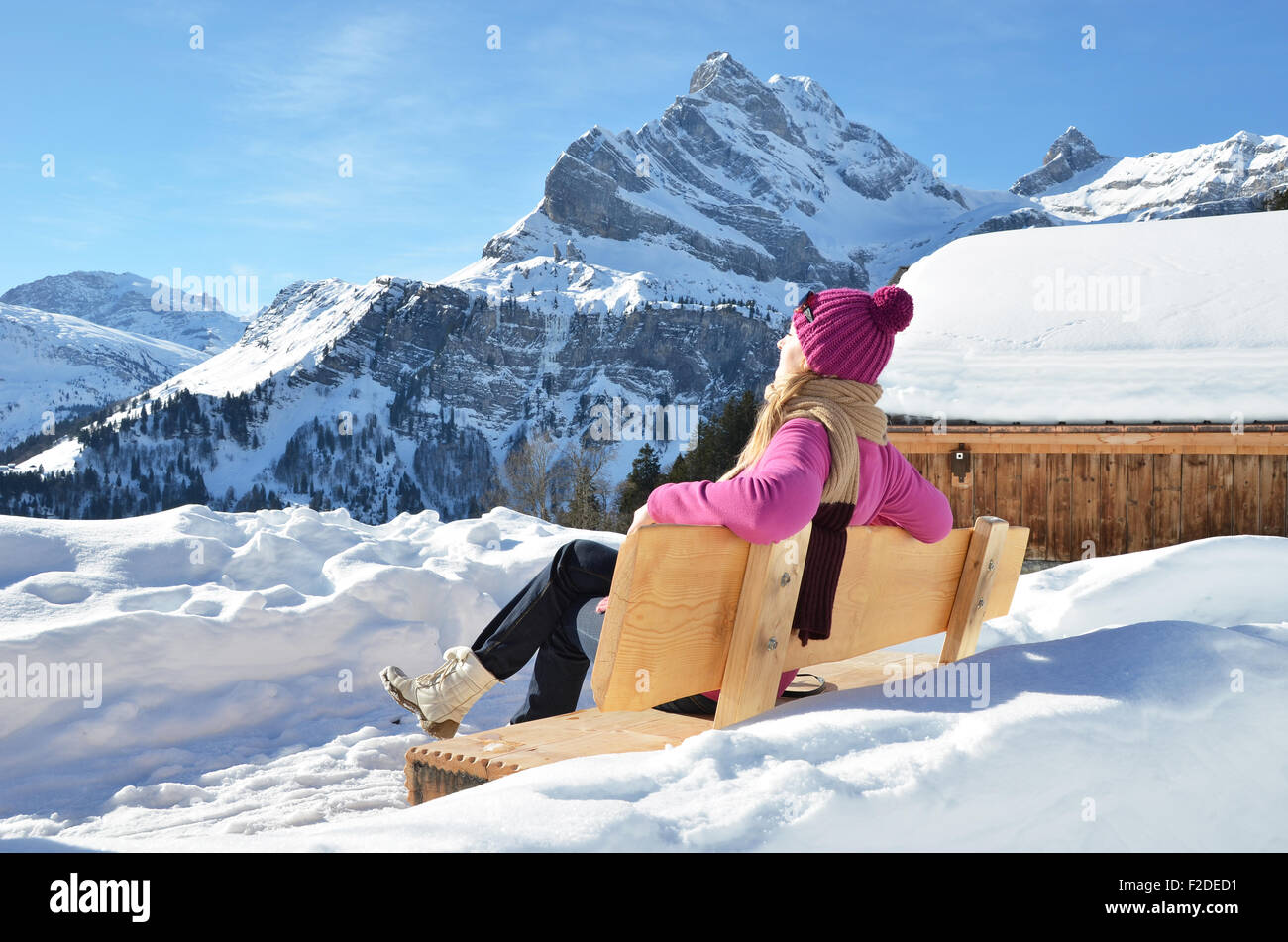 Traveler enjoying Alpine panorama. Switzerland Stock Photo - Alamy