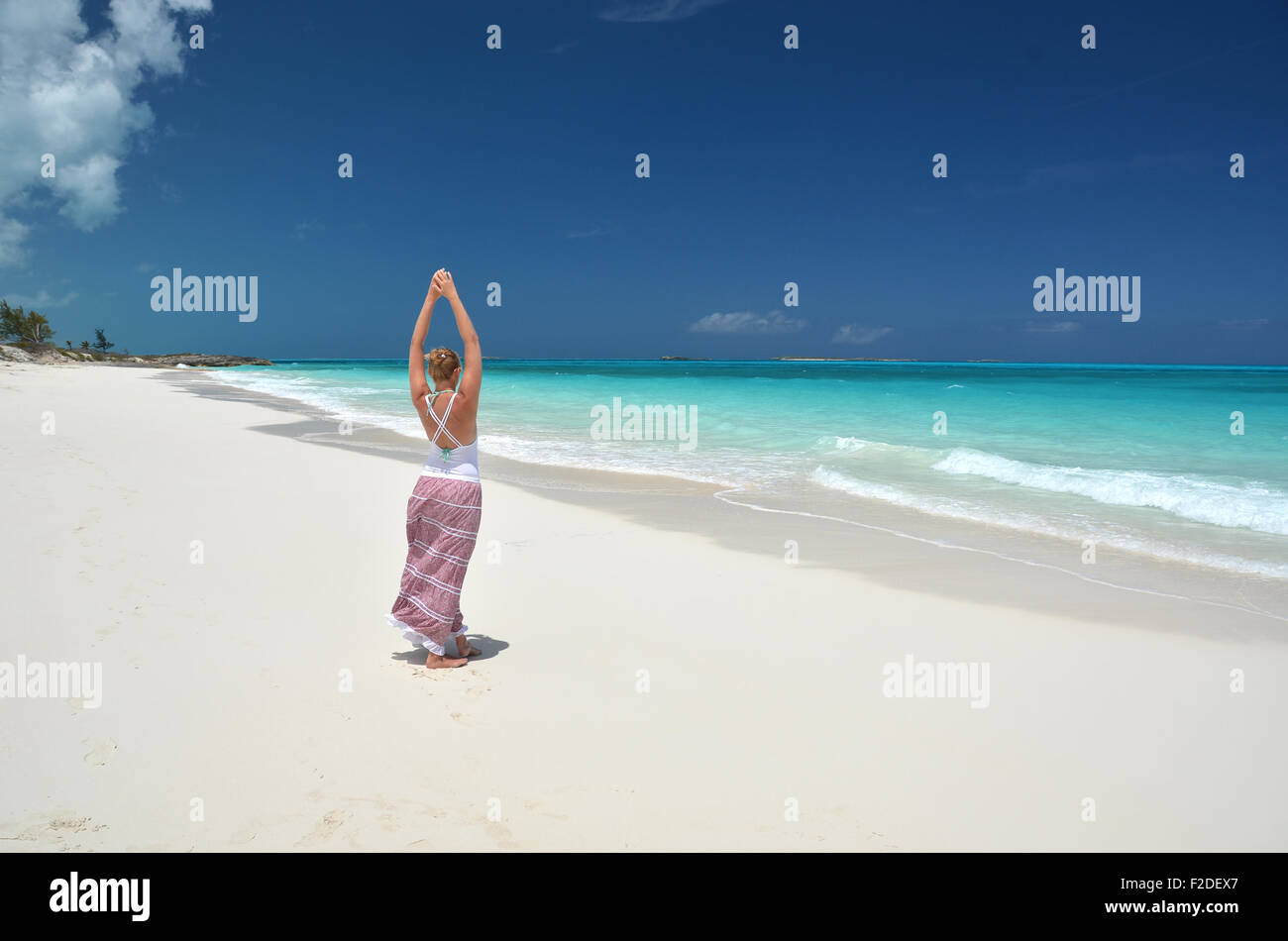 Girl on the desrt beach of Little Exuma, Bahamas Stock Photo - Alamy