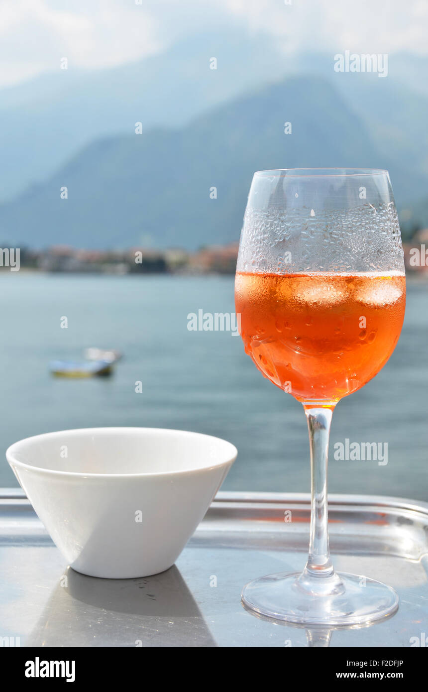 Traditional Italian Spritz cocktail against lake Como, Italy Stock ...