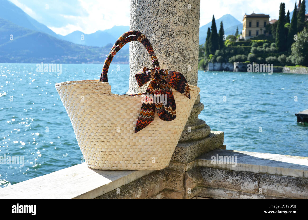 Basket against lake Como, Italy Stock Photo - Alamy