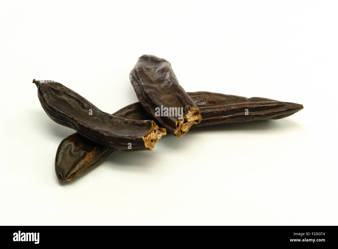 Dried carob fruit Cut Out Stock Images & Pictures - Alamy