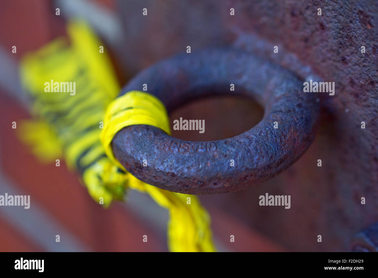 Rusty ring on the side of an old factory Stock Photo - Alamy