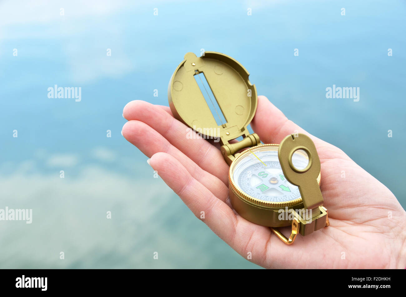 Compass in the hand Stock Photo - Alamy