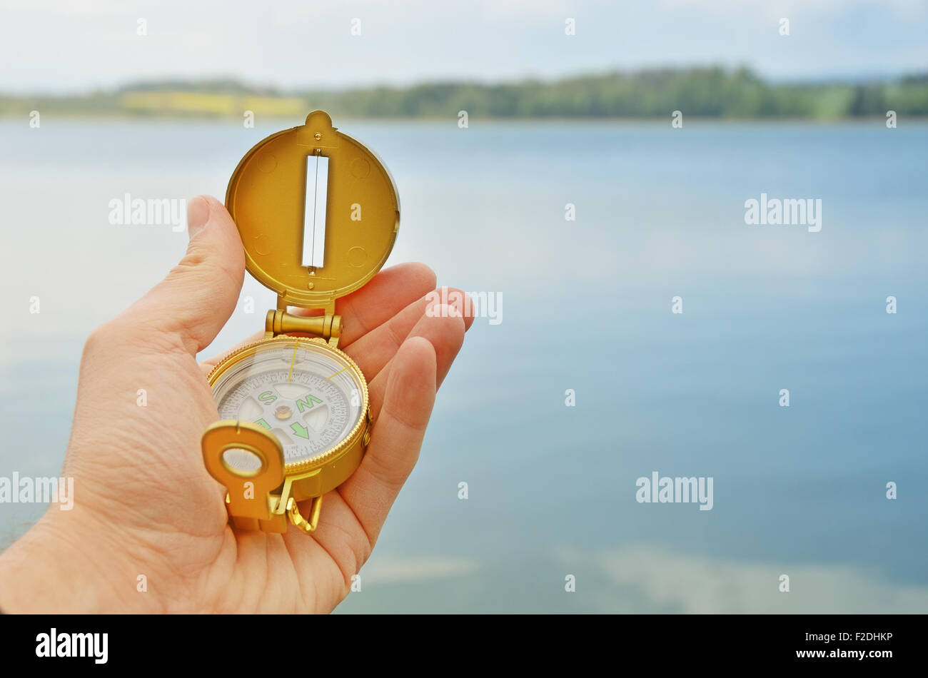 Compass in the hand Stock Photo - Alamy