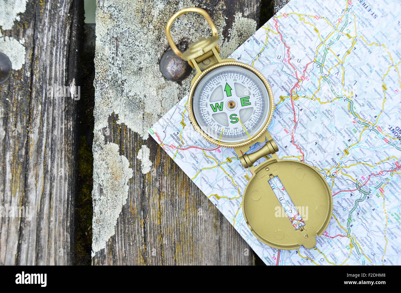 Compass and map Stock Photo - Alamy