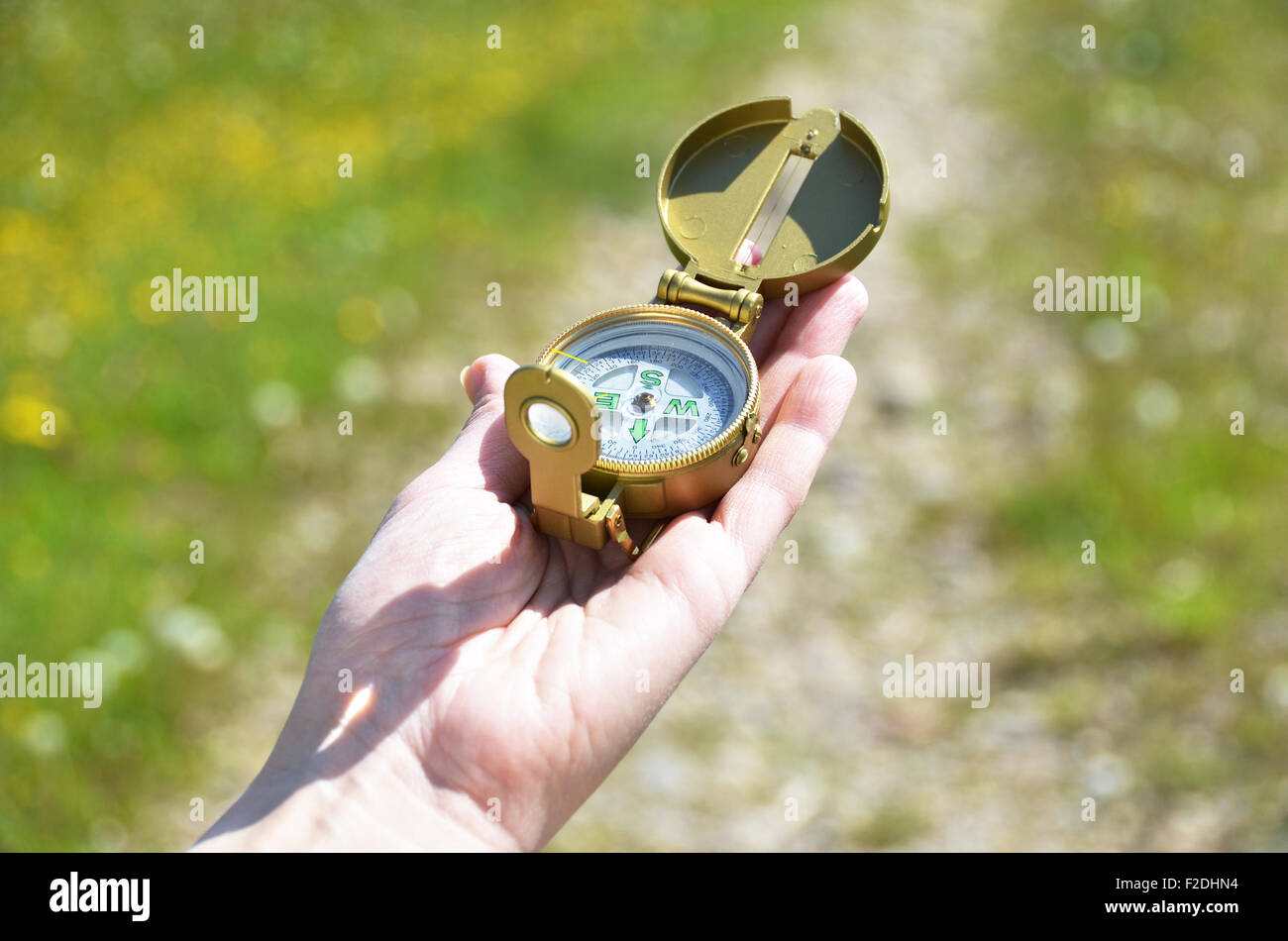 Compass in the hand Stock Photo - Alamy