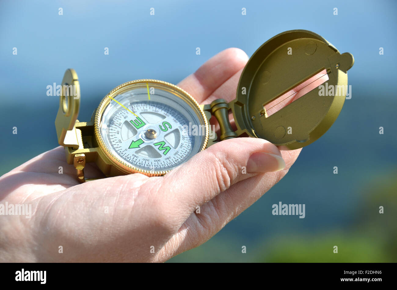 Compass in the hand Stock Photo - Alamy