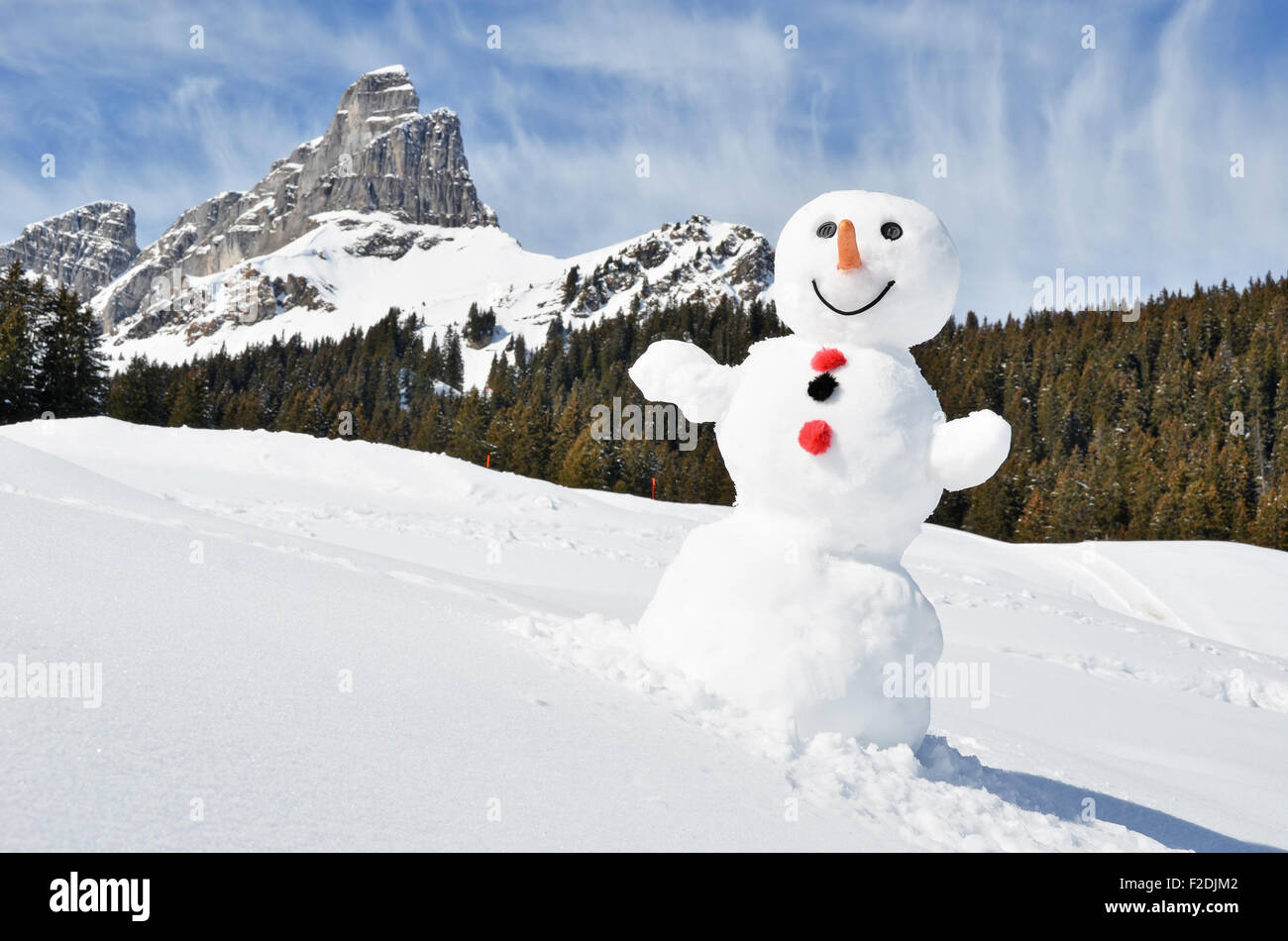 Snowman in the Swiss Alps Stock Photo - Alamy