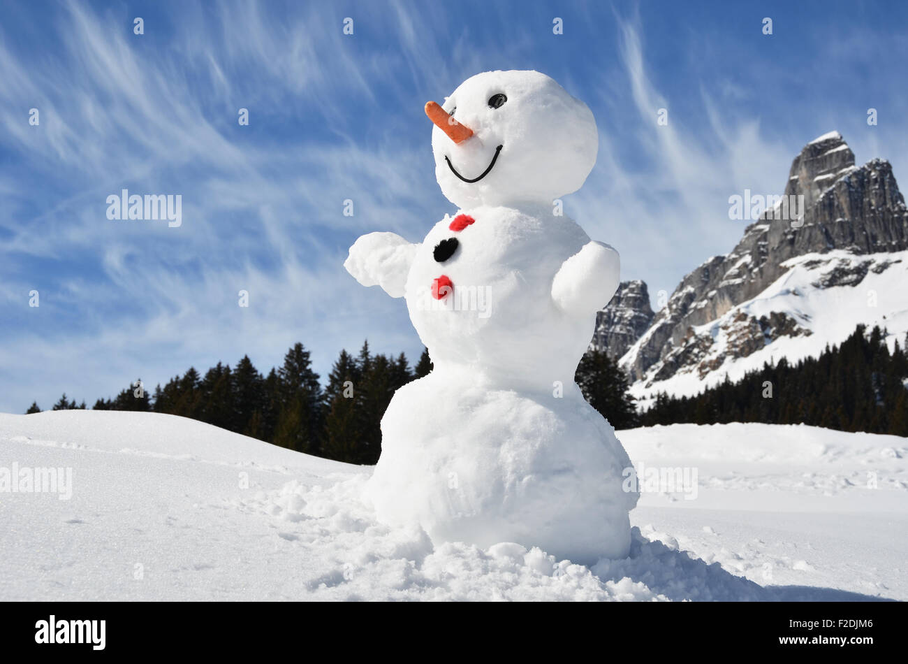 Snowman in the Swiss Alps Stock Photo - Alamy