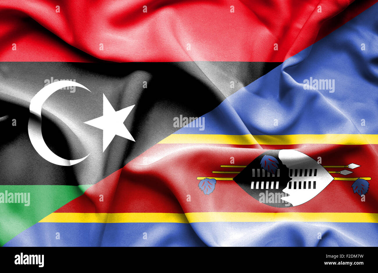Waving flag of Swazliand and Libya Stock Photo - Alamy