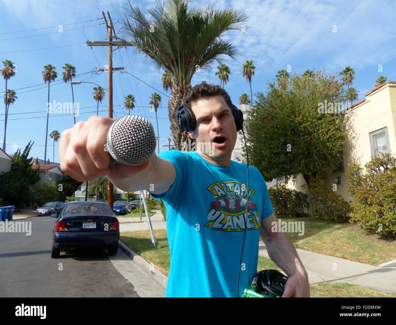 German YouTuber Flula Borg with his Mixpult and microphone on a street ...