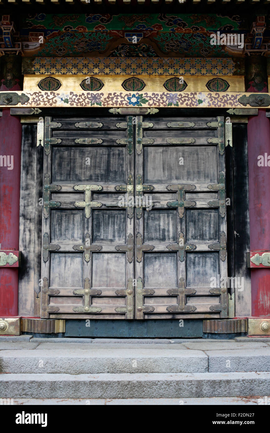 Ancient wooden shrine temple door with metal details Stock Photo - Alamy