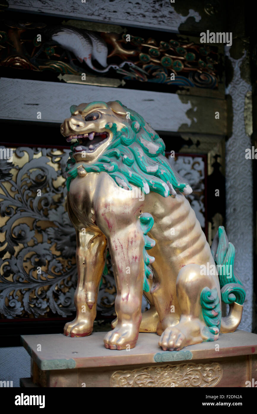 Guard dog gaurdian shrine temple blue accents Stock Photo - Alamy