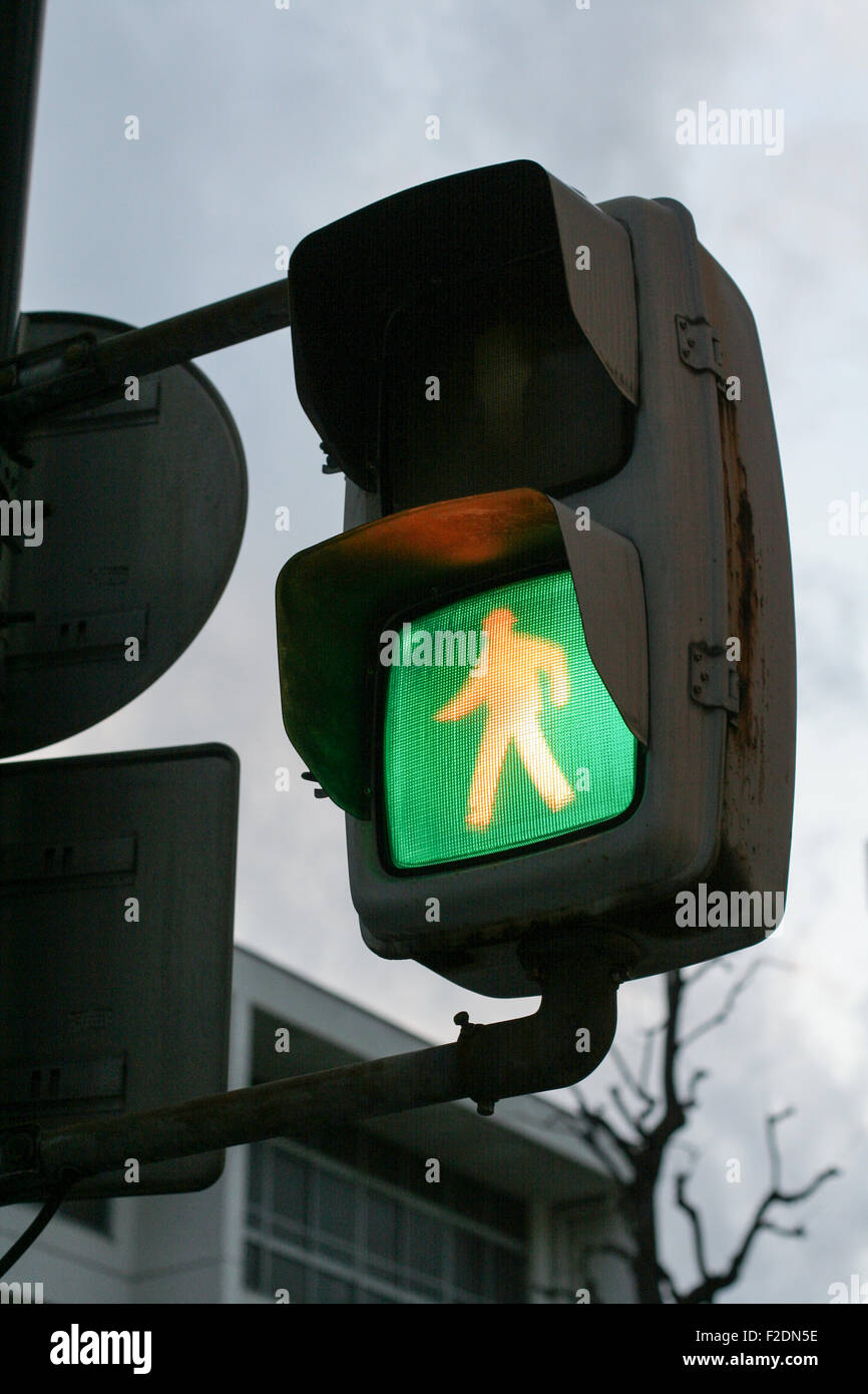Crosswalk sign green go Stock Photo - Alamy