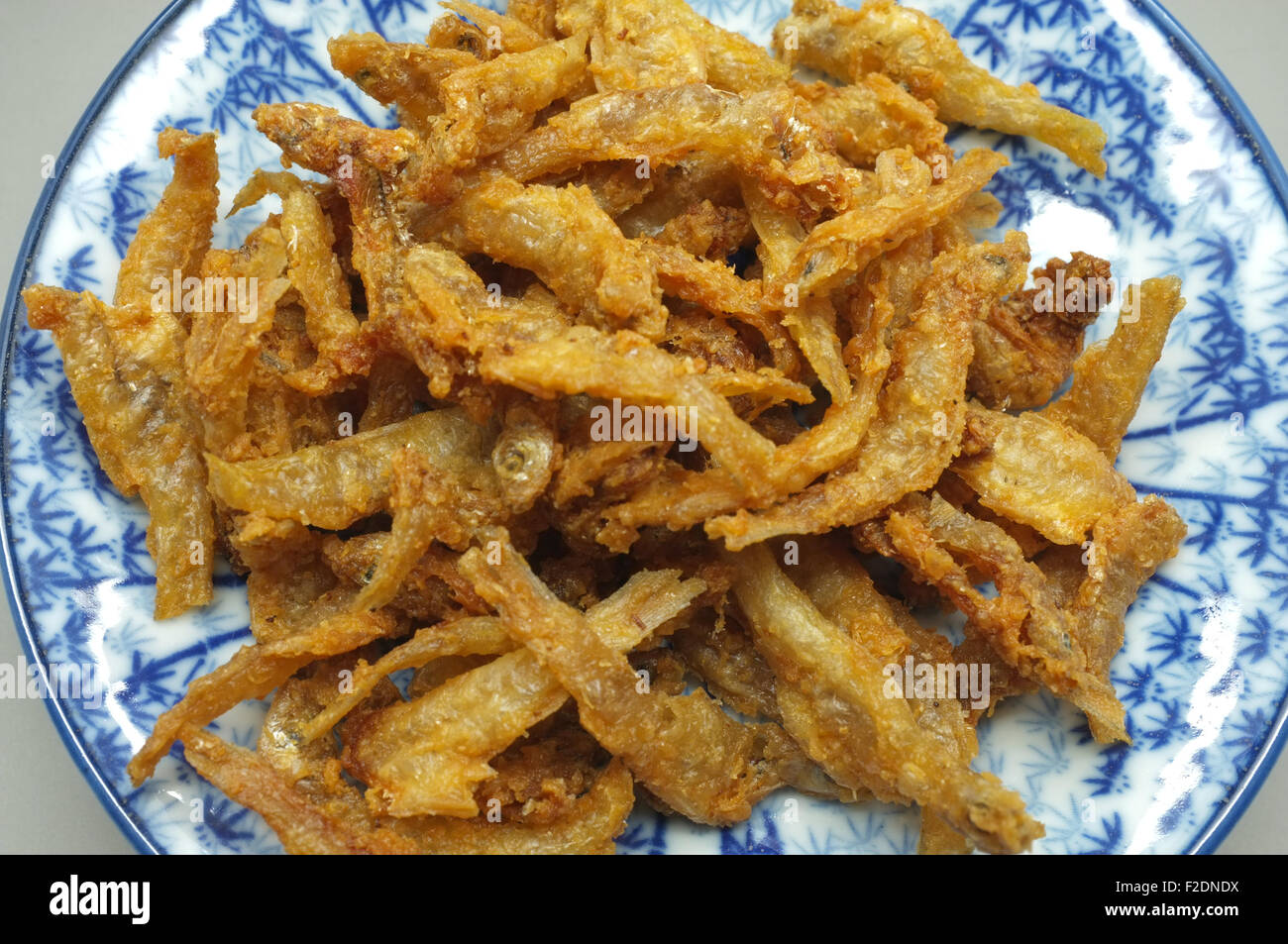 Crispy deep fried dried fish Stock Photo - Alamy