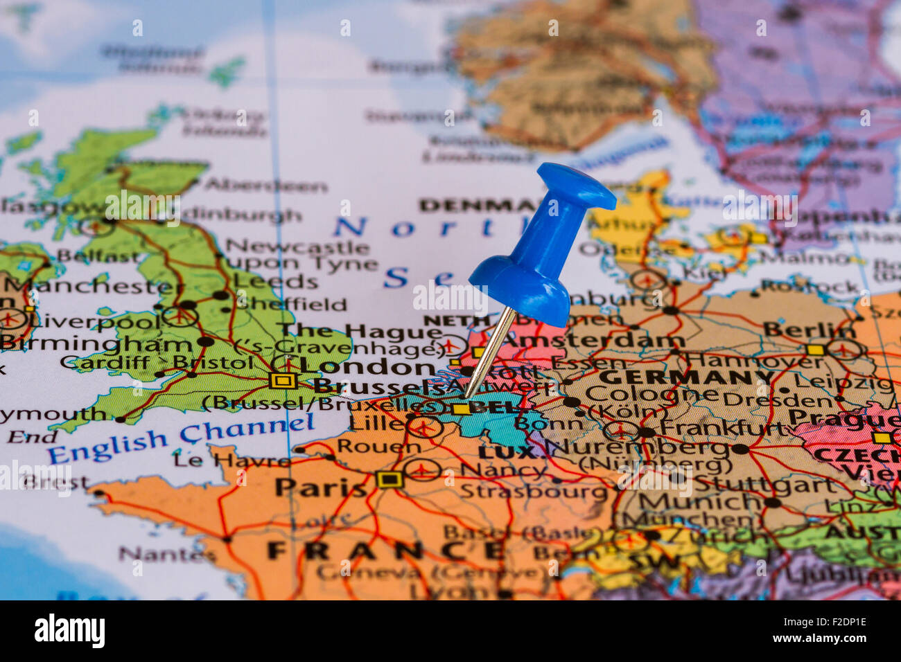 Map of belgium with a blue pushpin stuck Stock Photo - Alamy