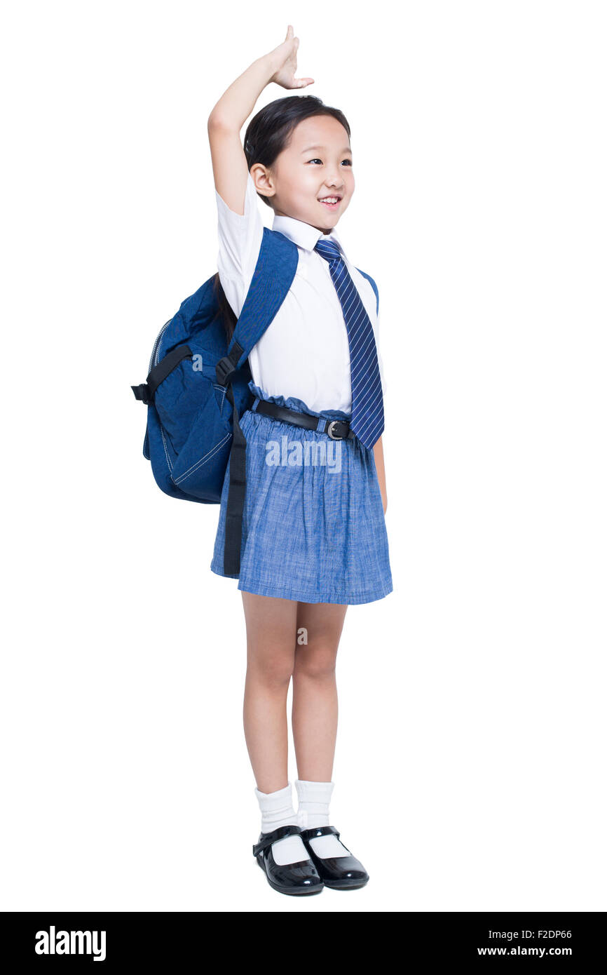 Happy schoolgirl saluting Stock Photo - Alamy