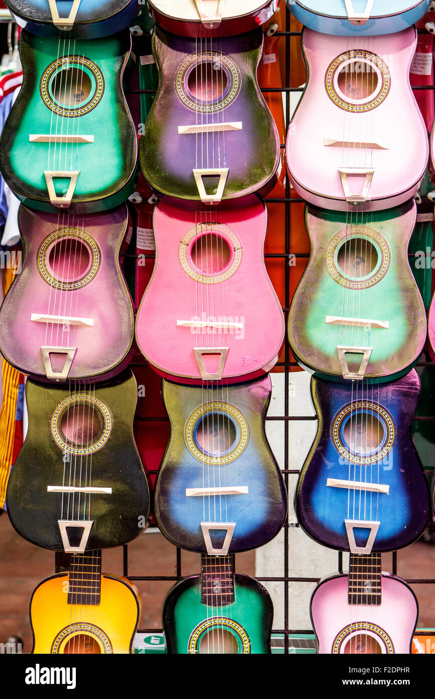 Small colorful guitars Stock Photo - Alamy