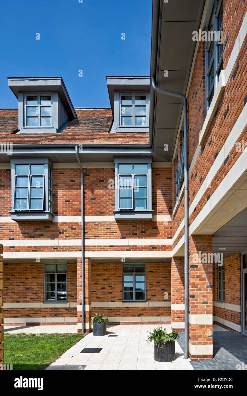 Perspective along brick colonnade with garden. Felsted School Boarding ...