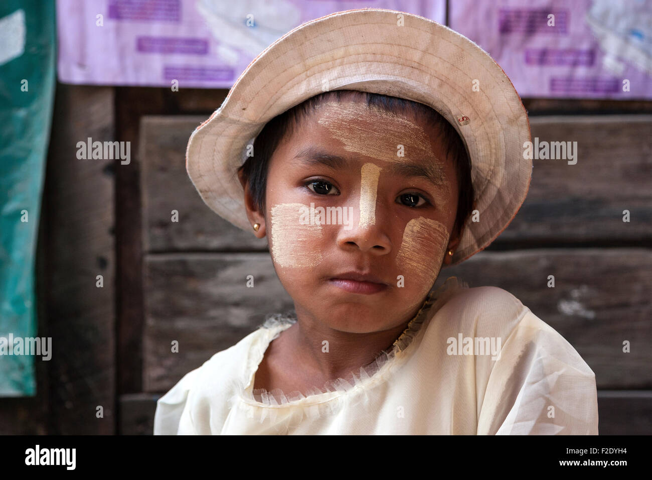 Native girl with Thanaka paste on her face, portrait, Ngapali, Thandwe ...