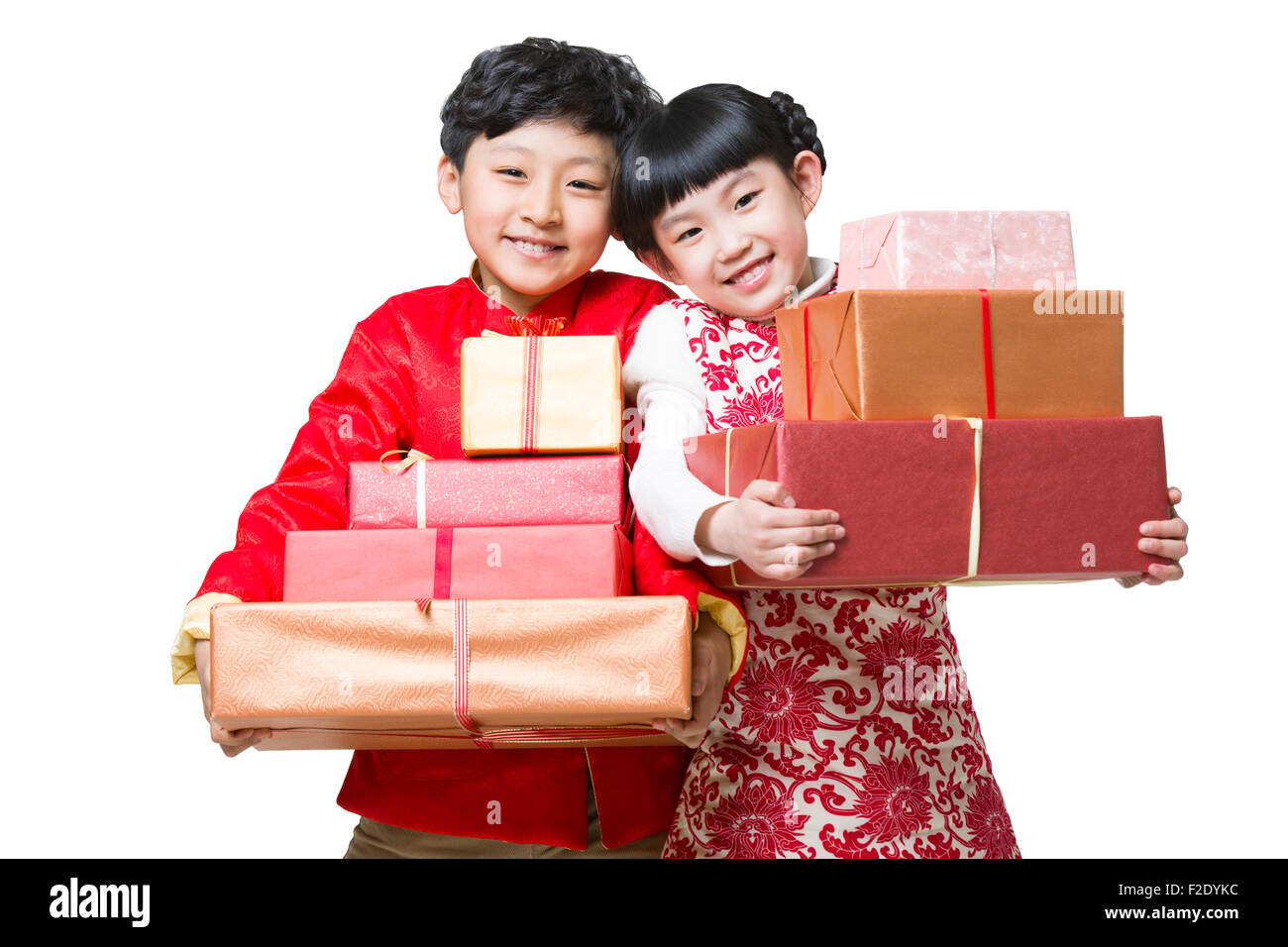 Happy children celebrating Chinese new year with gifts Stock Photo - Alamy