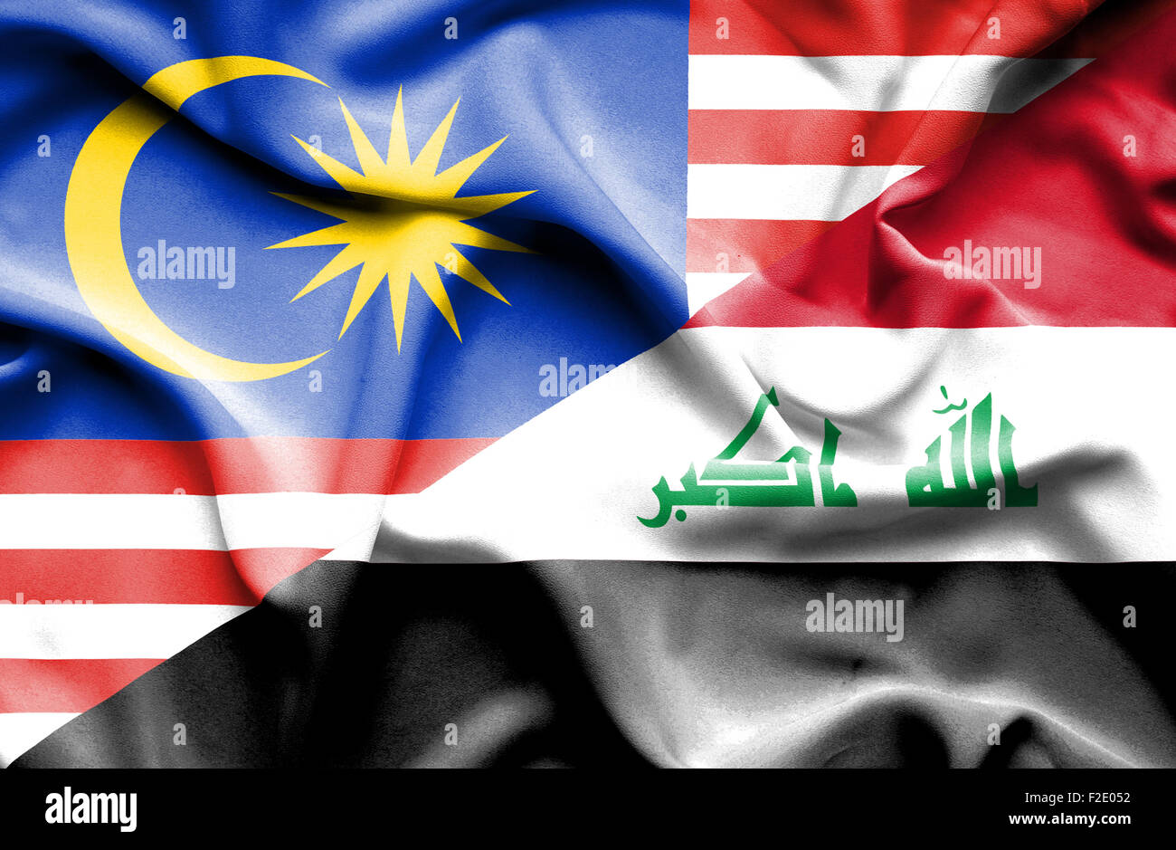Waving flag of Iraq and Malaysia Stock Photo - Alamy