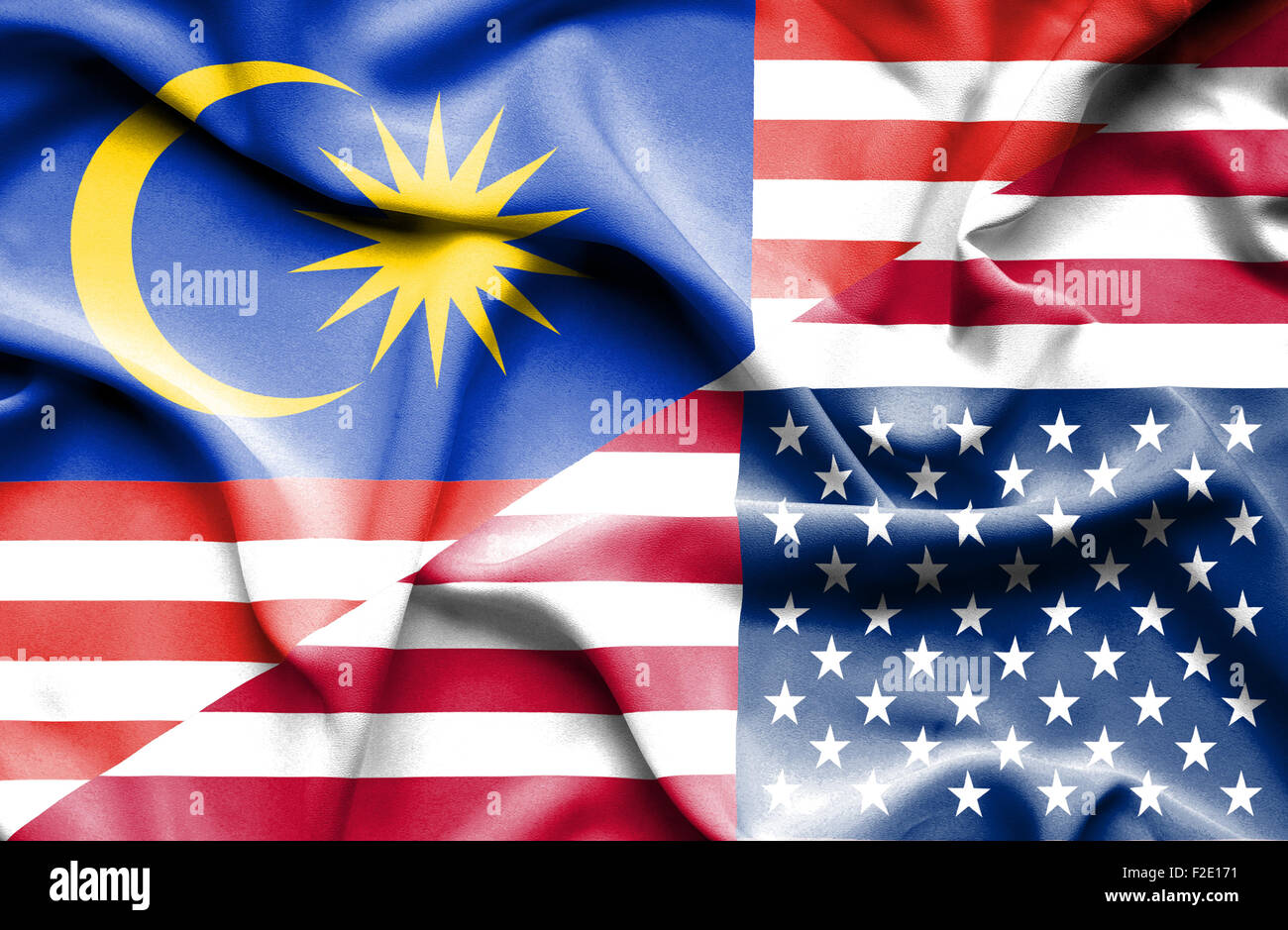 Waving flag of United States of America and Malaysia Stock Photo - Alamy