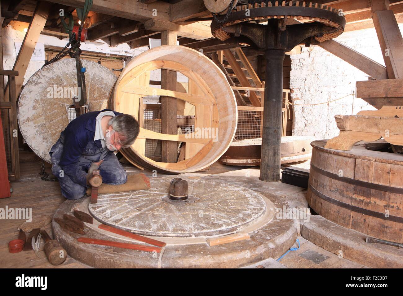 Millwright Martin Watts working on the Mill stones at Clyston Water ...