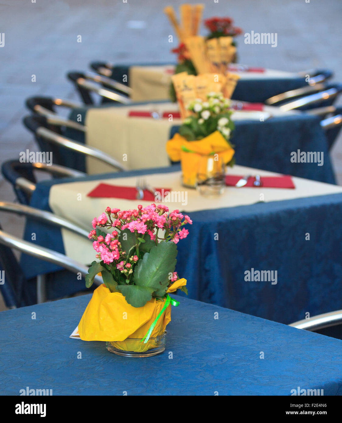 View of Tables set with flower bouquet Stock Photo - Alamy