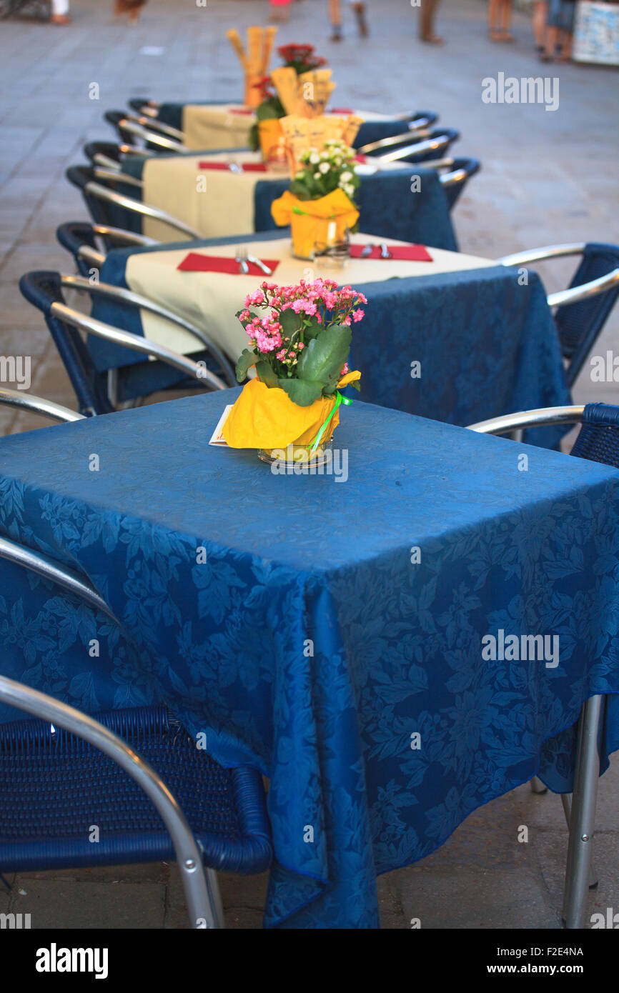 View of Tables set with flower bouquet Stock Photo - Alamy