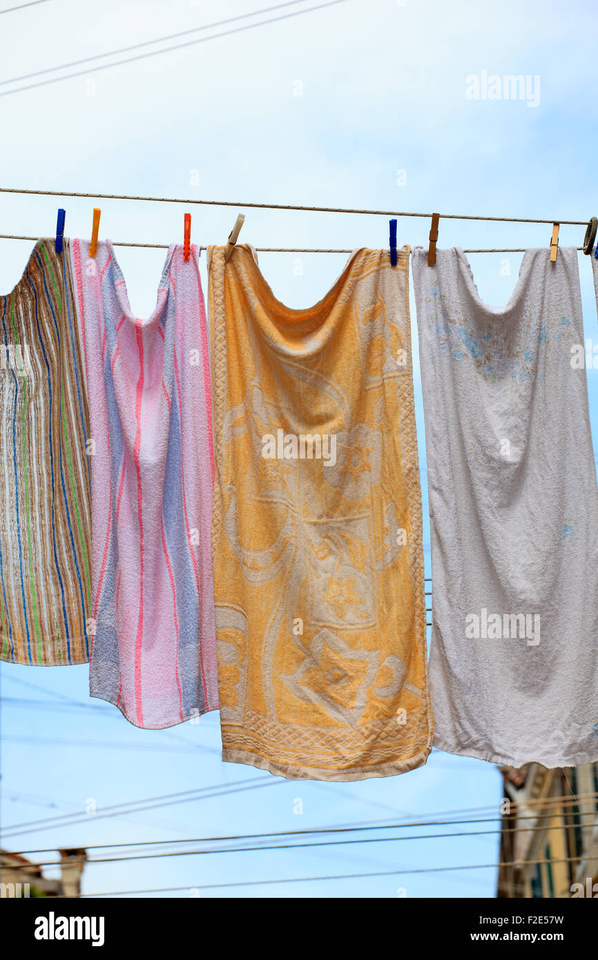 Clothes hanging to dry on a clothes-line Stock Photo - Alamy