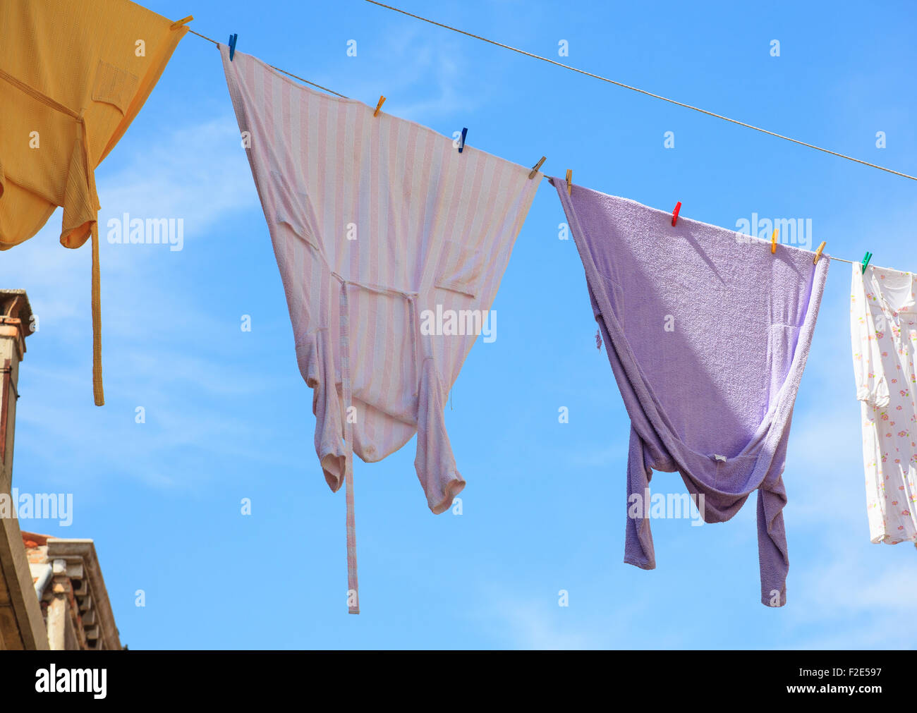 Clothes hanging to dry on a clothes-line Stock Photo - Alamy