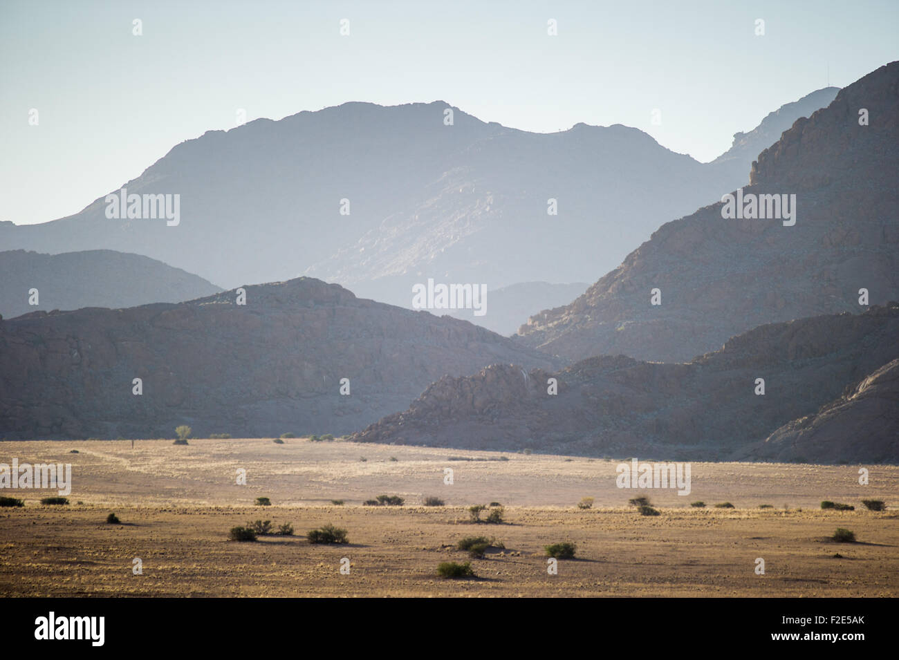 Open Landscape with cascading mountains in the distance in Namibia ...