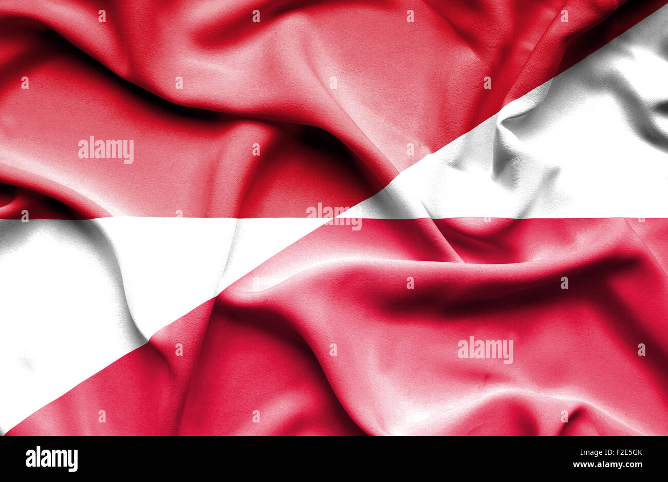Waving flag of Poland and Monaco Stock Photo - Alamy