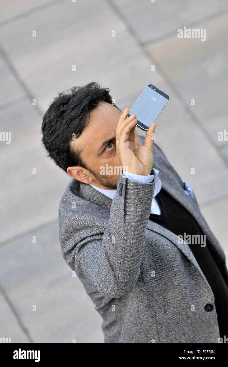 Man taking a photograph with a mobile phone Stock Photo - Alamy