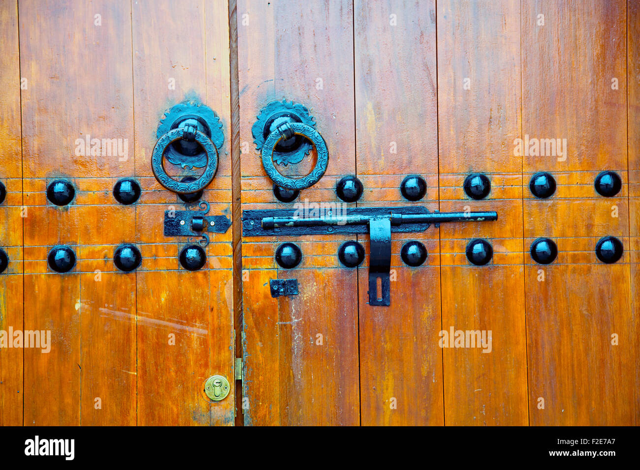 brown morocco in africa the old wood facade home and rusty safe padlock ...