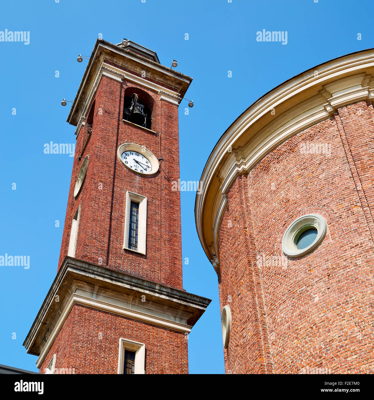 ancien clock tower in italy europe old stone and bell Stock Photo - Alamy
