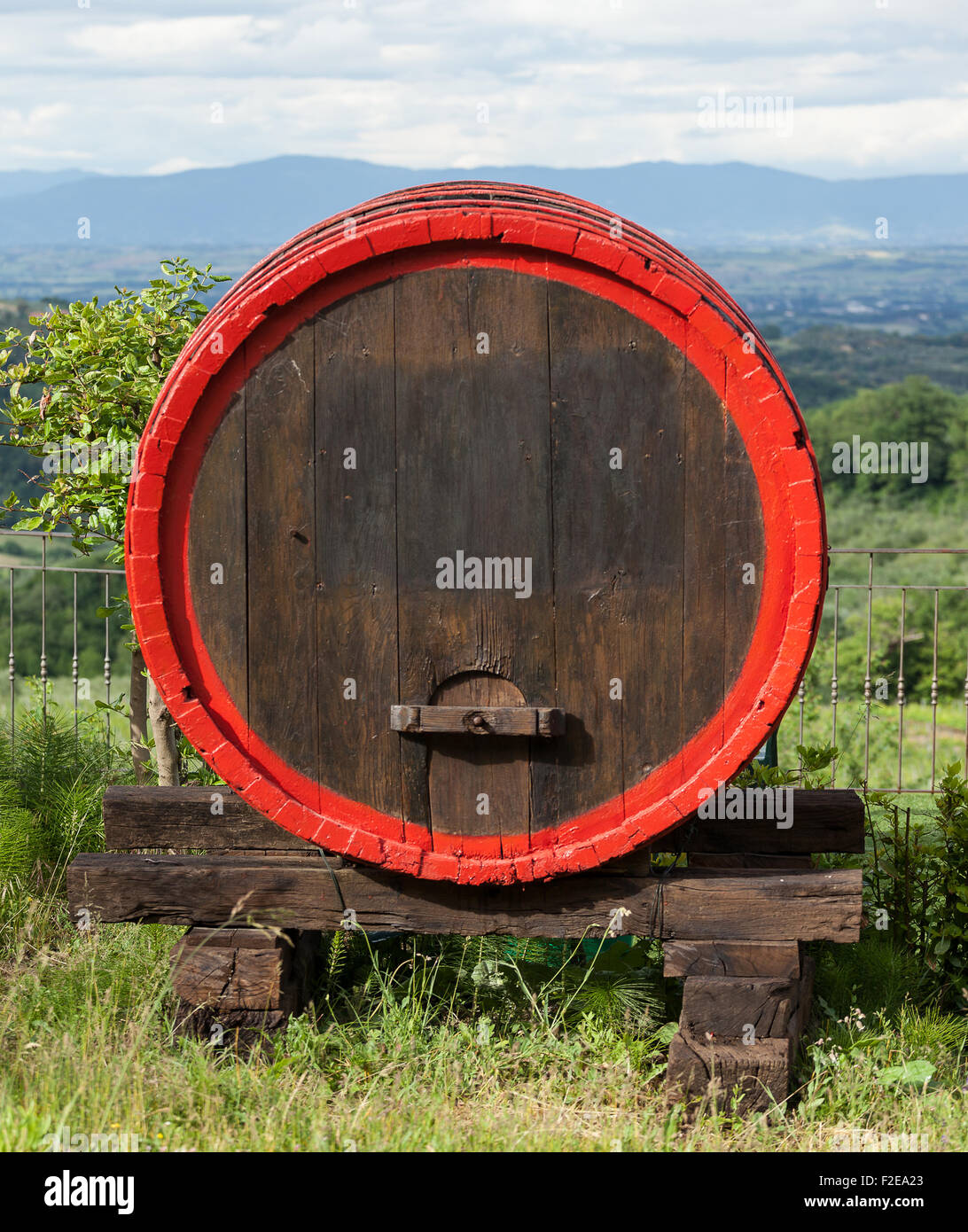 Wooden barrel for wine placed in outdoor field, Tuscany Stock Photo - Alamy