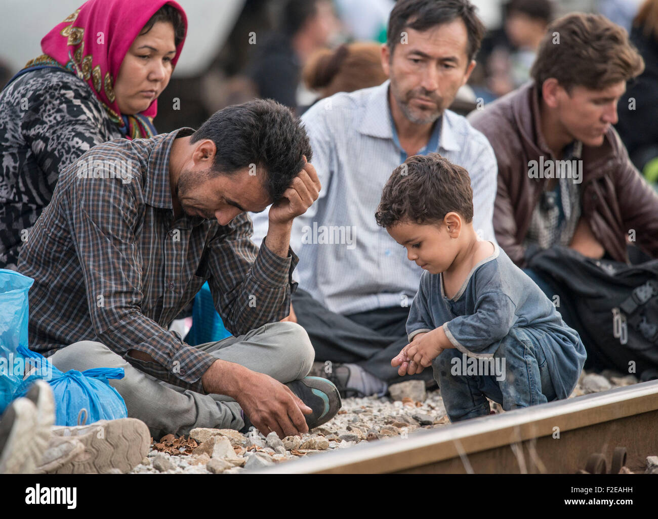 Dugo Selo, Croatia. 17th Sep, 2015. Refugees wait for buses at the ...