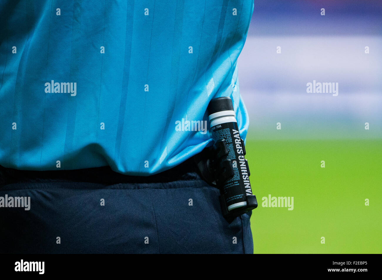 Leverkusen, Germany. 16th Sep, 2015. An assistant referee carries a can ...