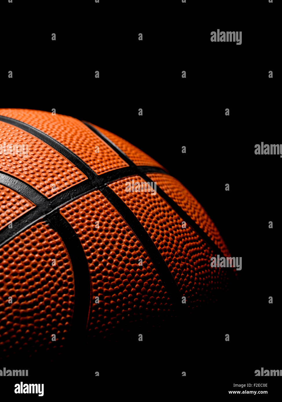 Single Basketball on a black background Stock Photo - Alamy