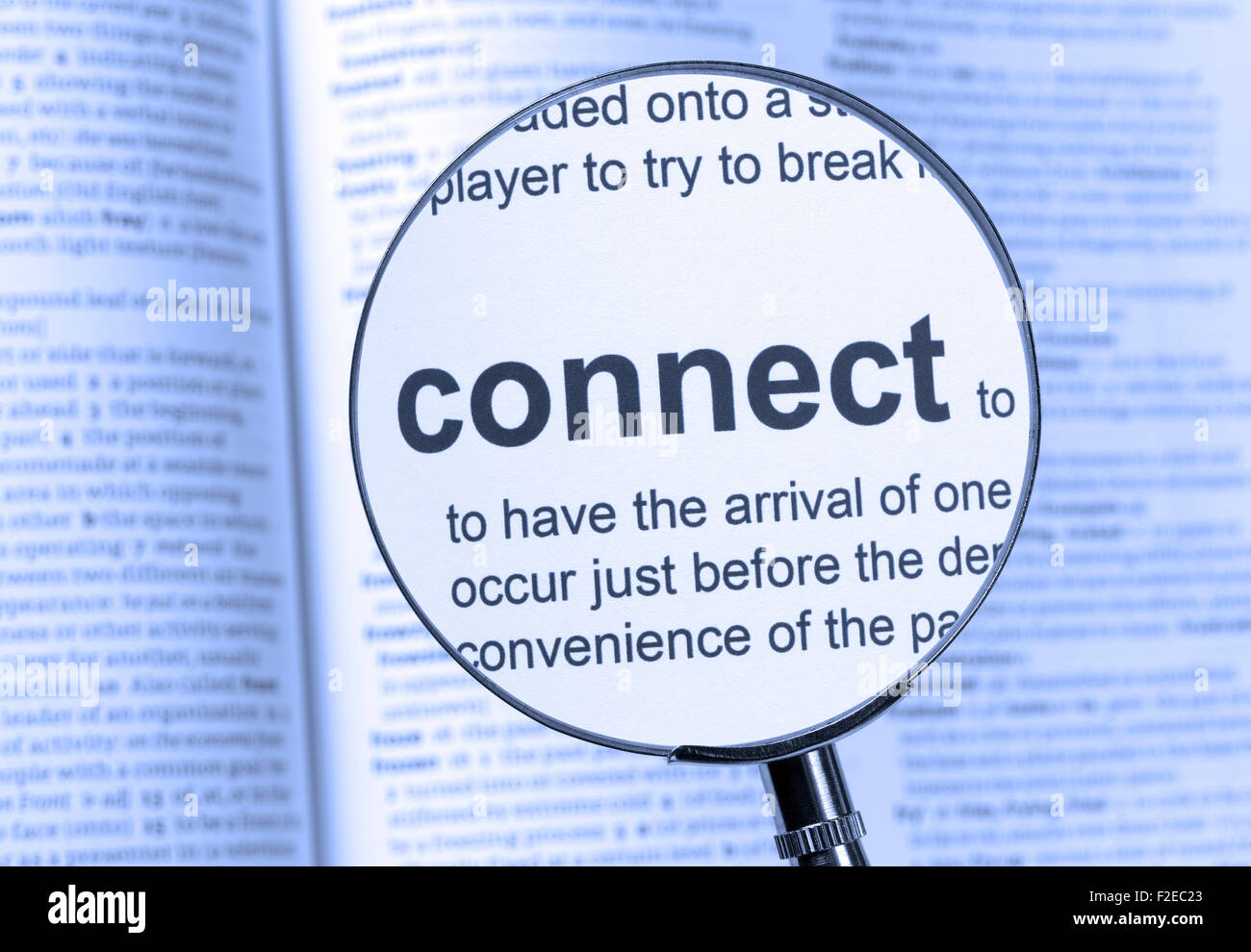 Connect text highlighted through a magnifying glass Stock Photo - Alamy