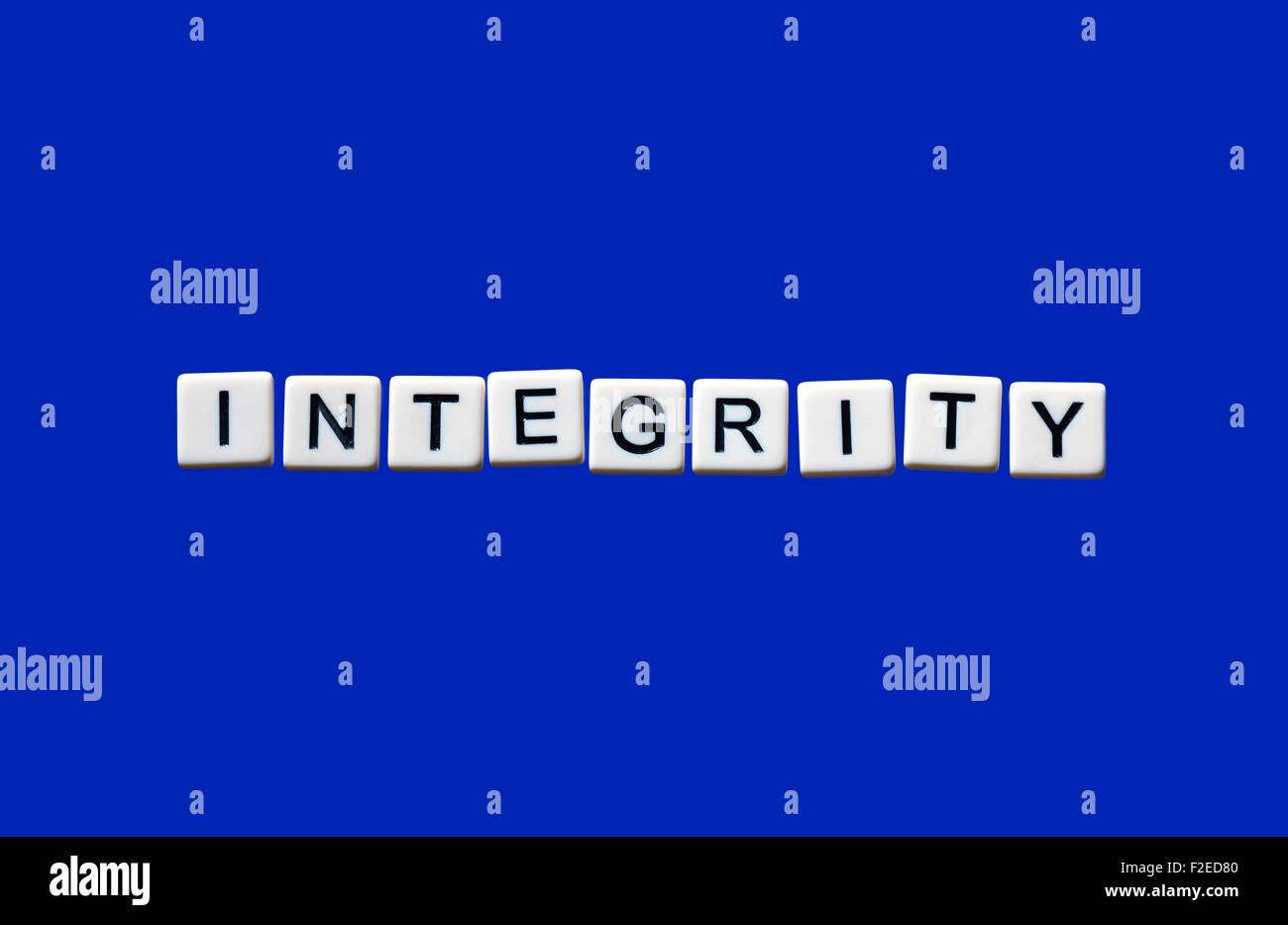 Integrity highlighted on white blocks Stock Photo - Alamy