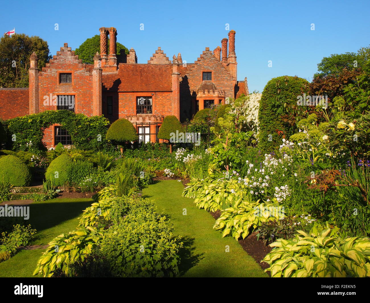 Chenies Manor, Buckinghamshire in early June showing lush green growth ...