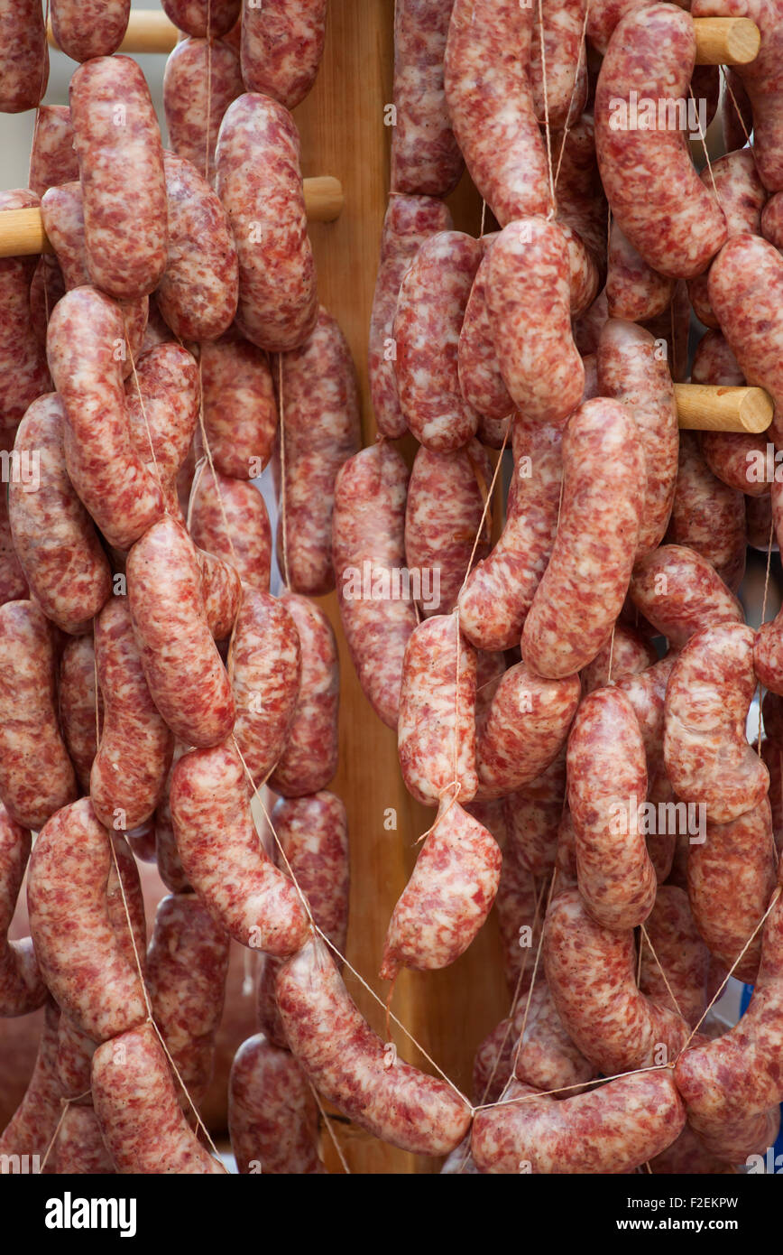 Chains of fresh sausages on market stall Stock Photo - Alamy