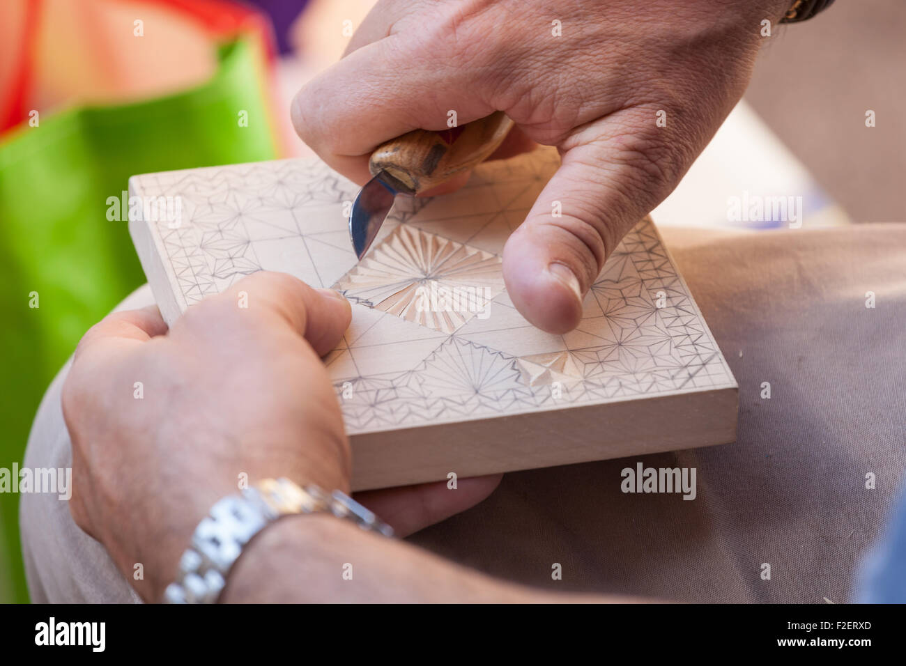 Close up hands of a craftsman while carving the wood Stock Photo - Alamy