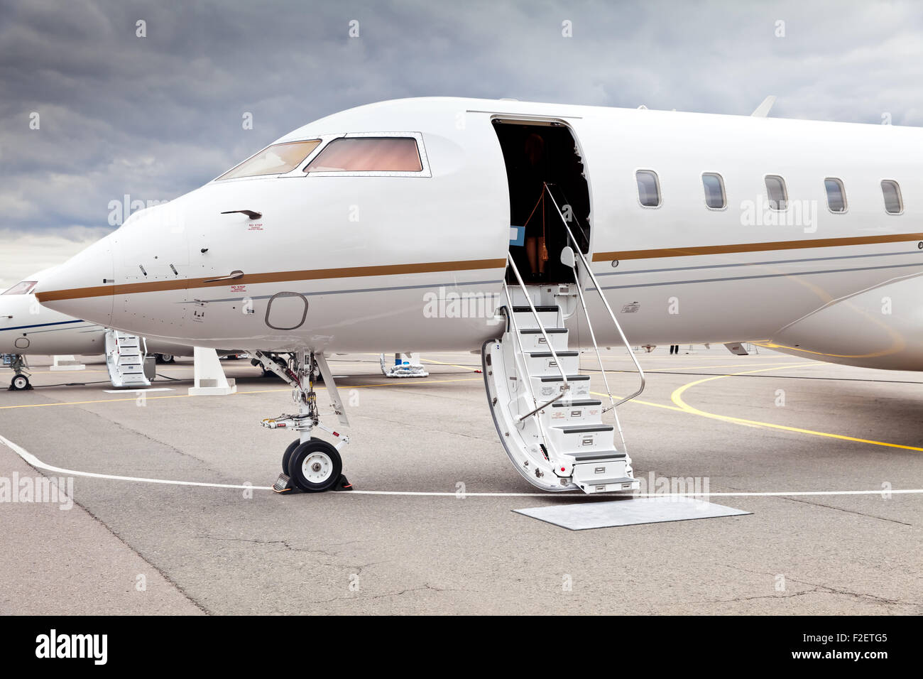 White private business jet and open ladder at the airport Stock Photo ...